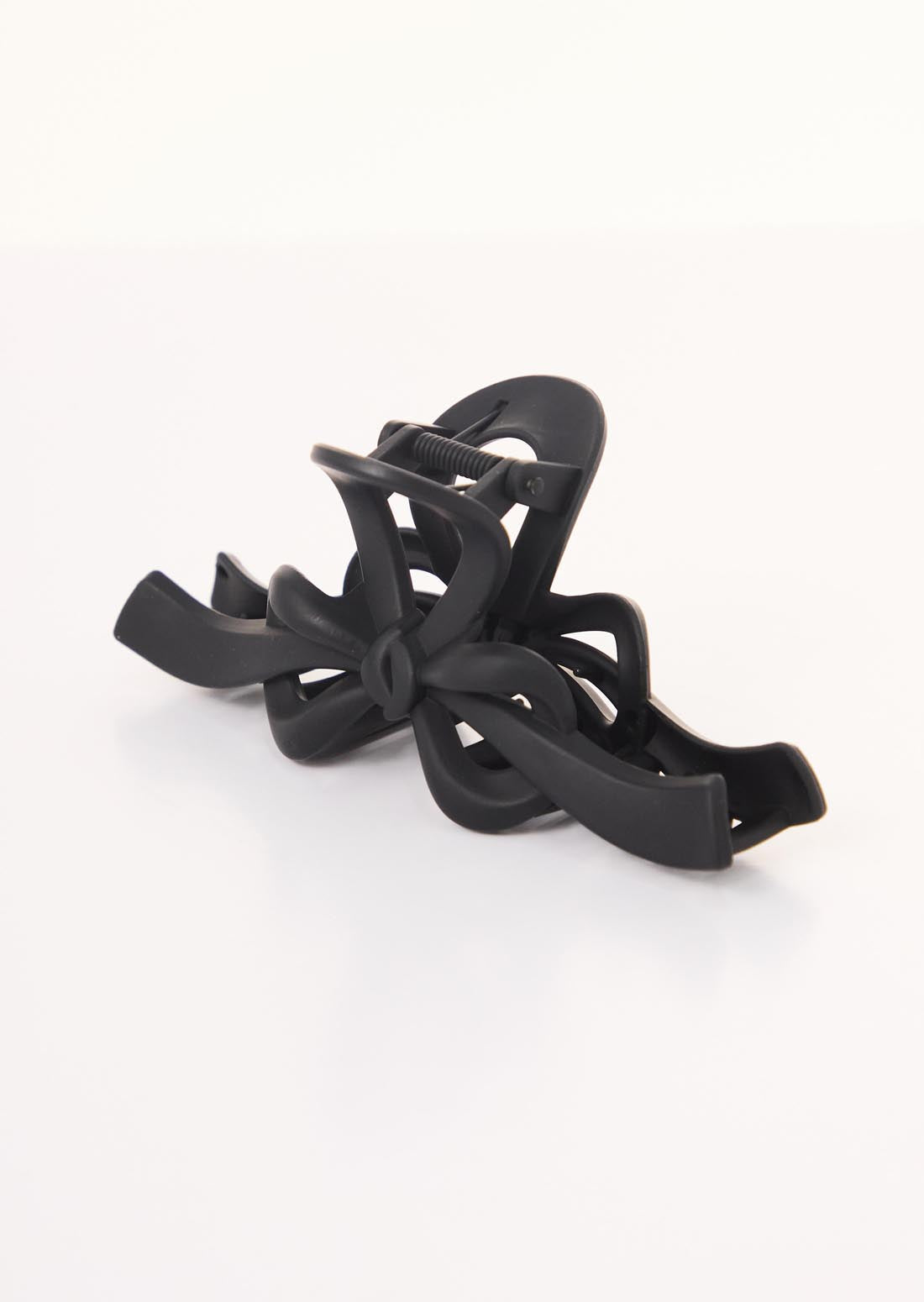 Pinza negra en forma de moño para el cabello para jóvenes – Stop Jeans